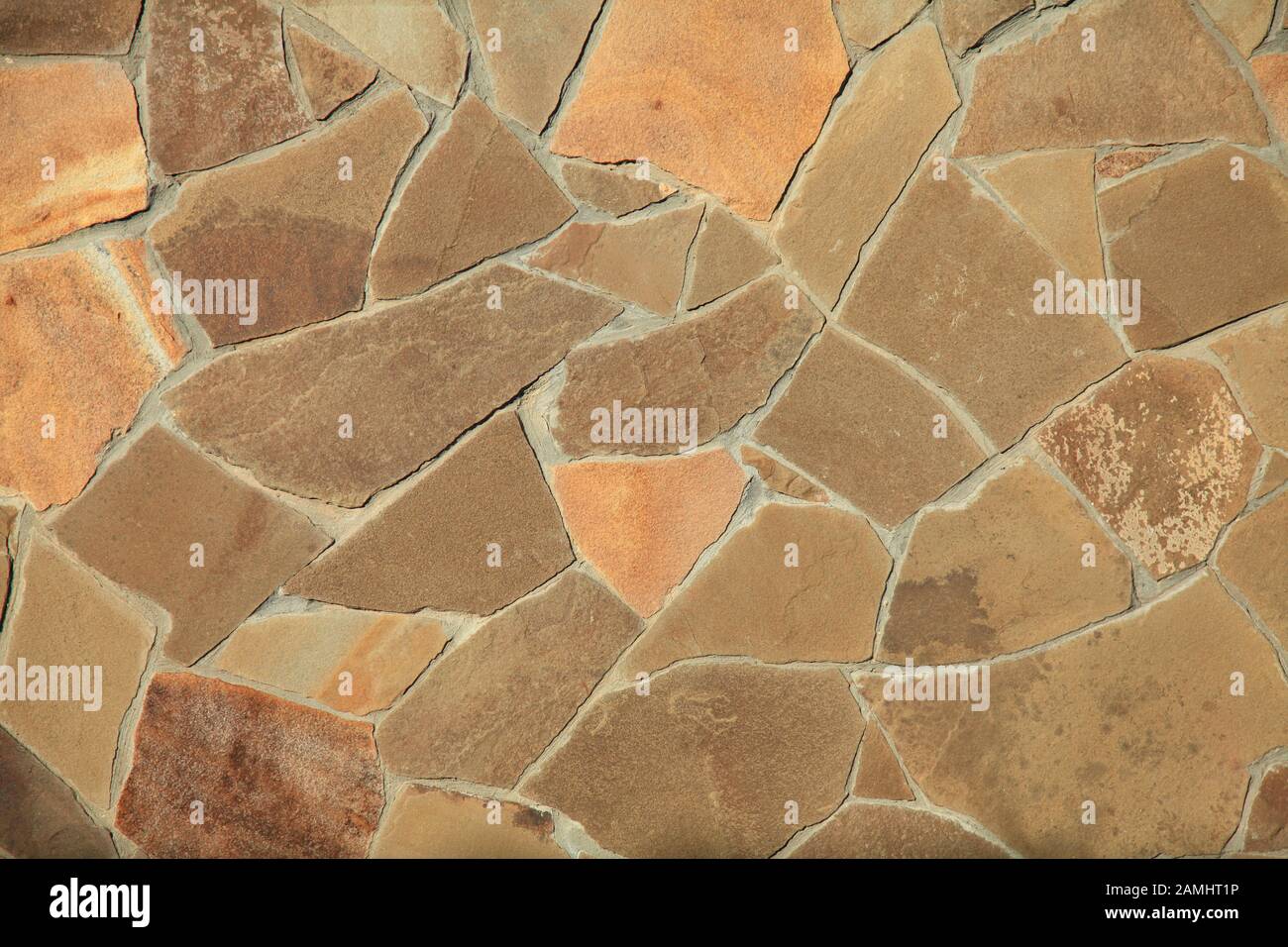 The light texture of stone wall, background. Facing with granite stones ...