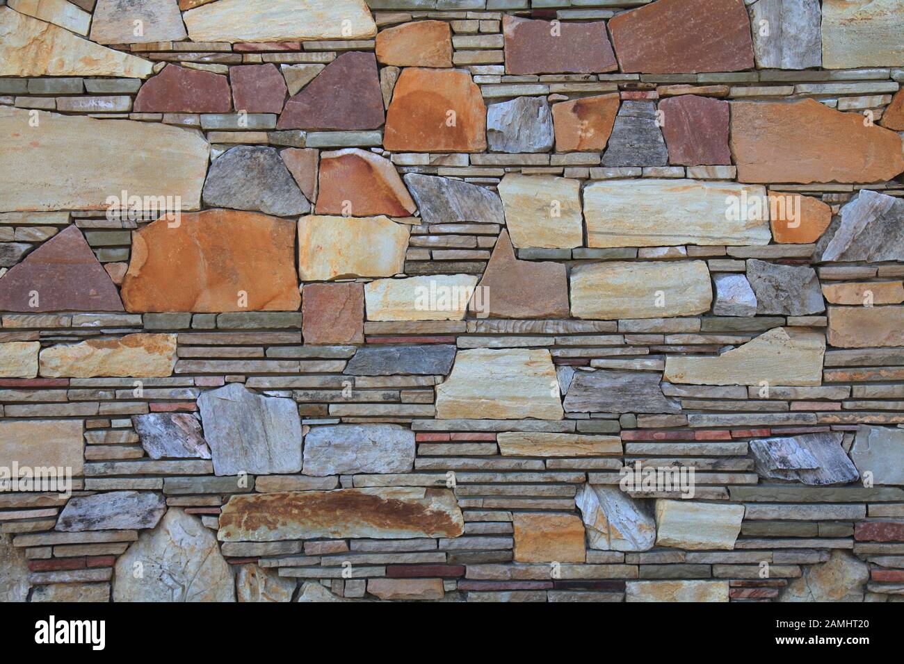 Multy-colored (colorful) decorative stone wall, texture, background ...