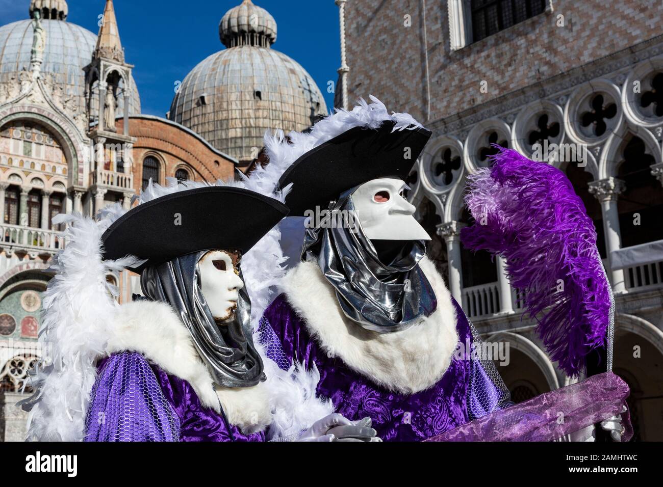 People with masks and costumes in St Mark's Square, Carnival in Venice, Veneto, Italy, Europe ...