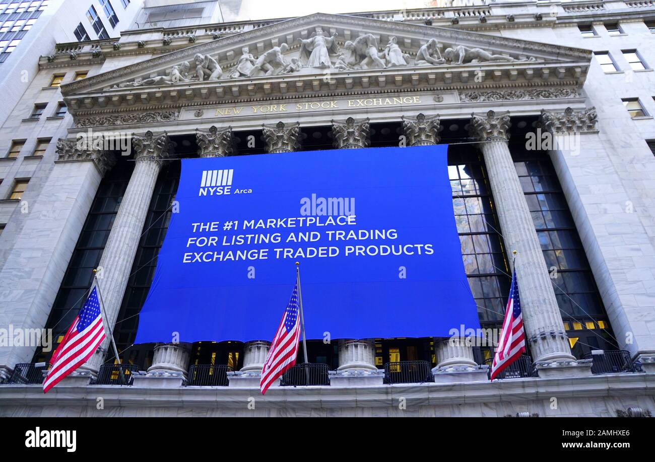NYSE banner hanging on the exterior wall of the New York Stock Exchange ...