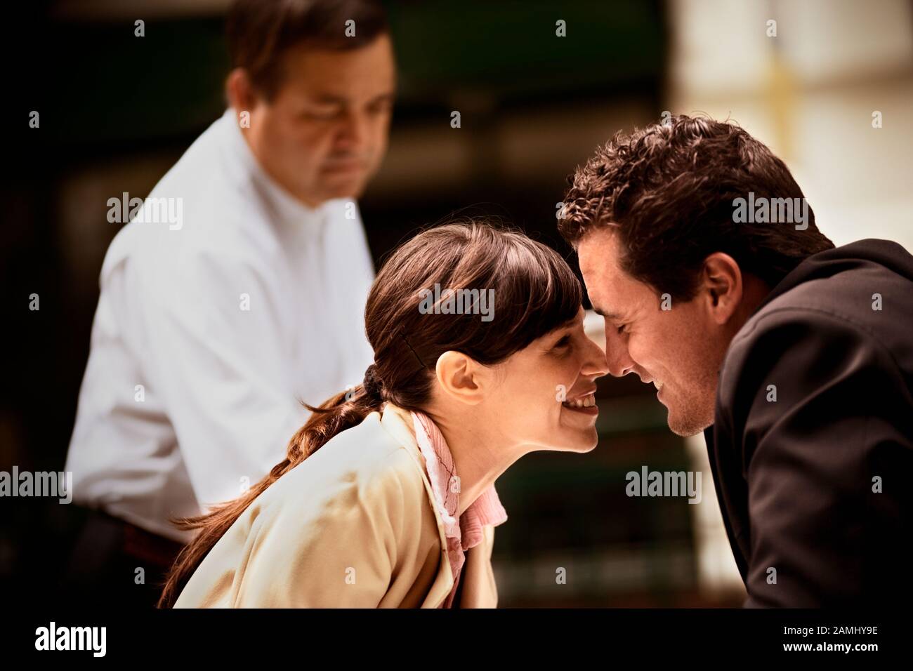 Side view of a couple in a romantic mood Stock Photo - Alamy