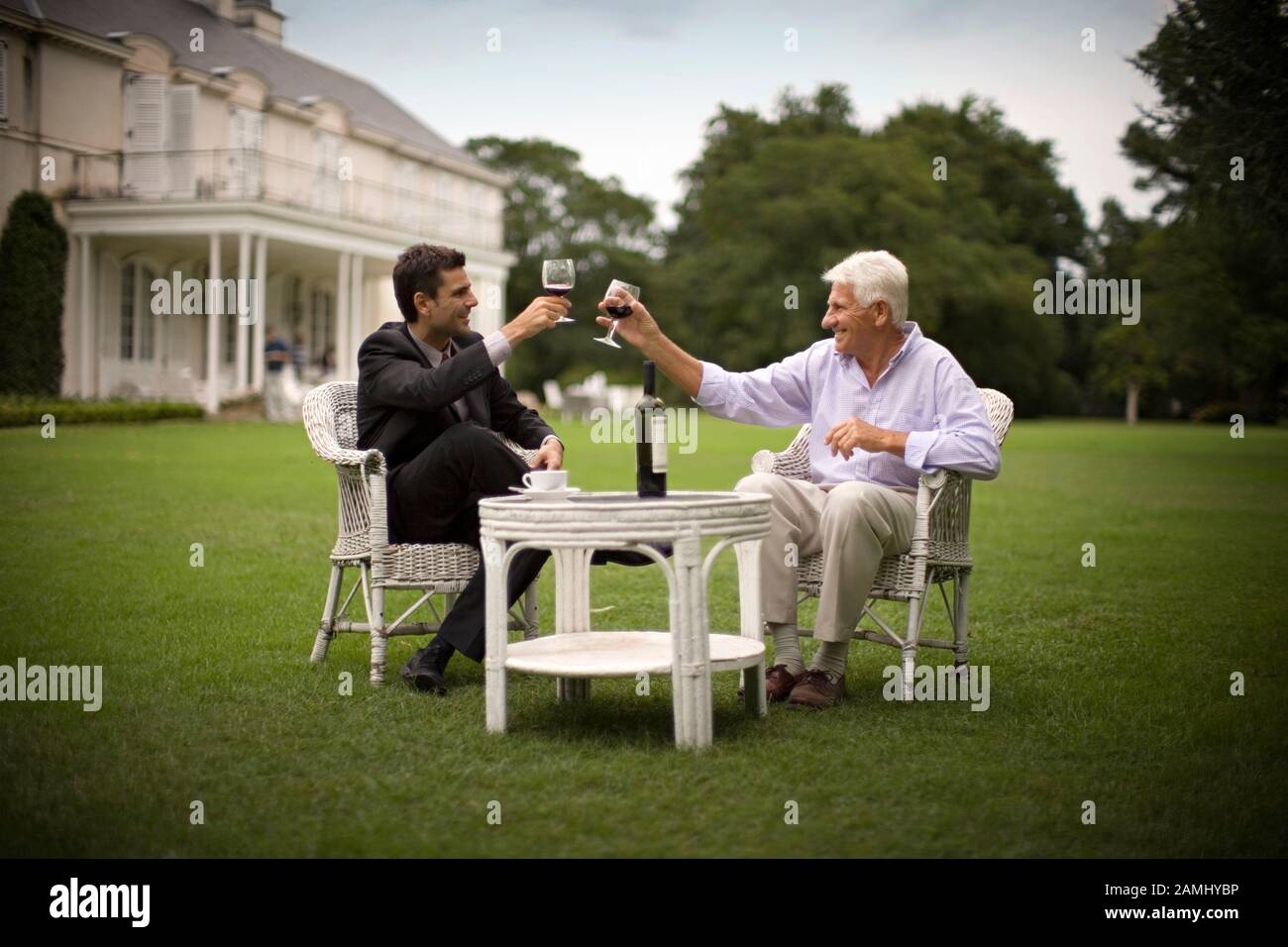 View of two gentlemen in formal attire having a conversation Stock ...