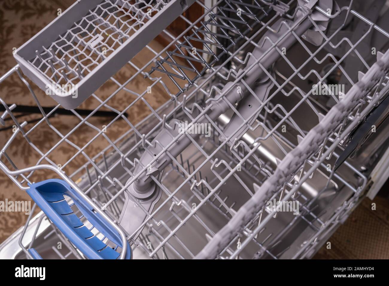 Dishwasher, gray mesh dishwasher Selective focus Stock Photo - Alamy