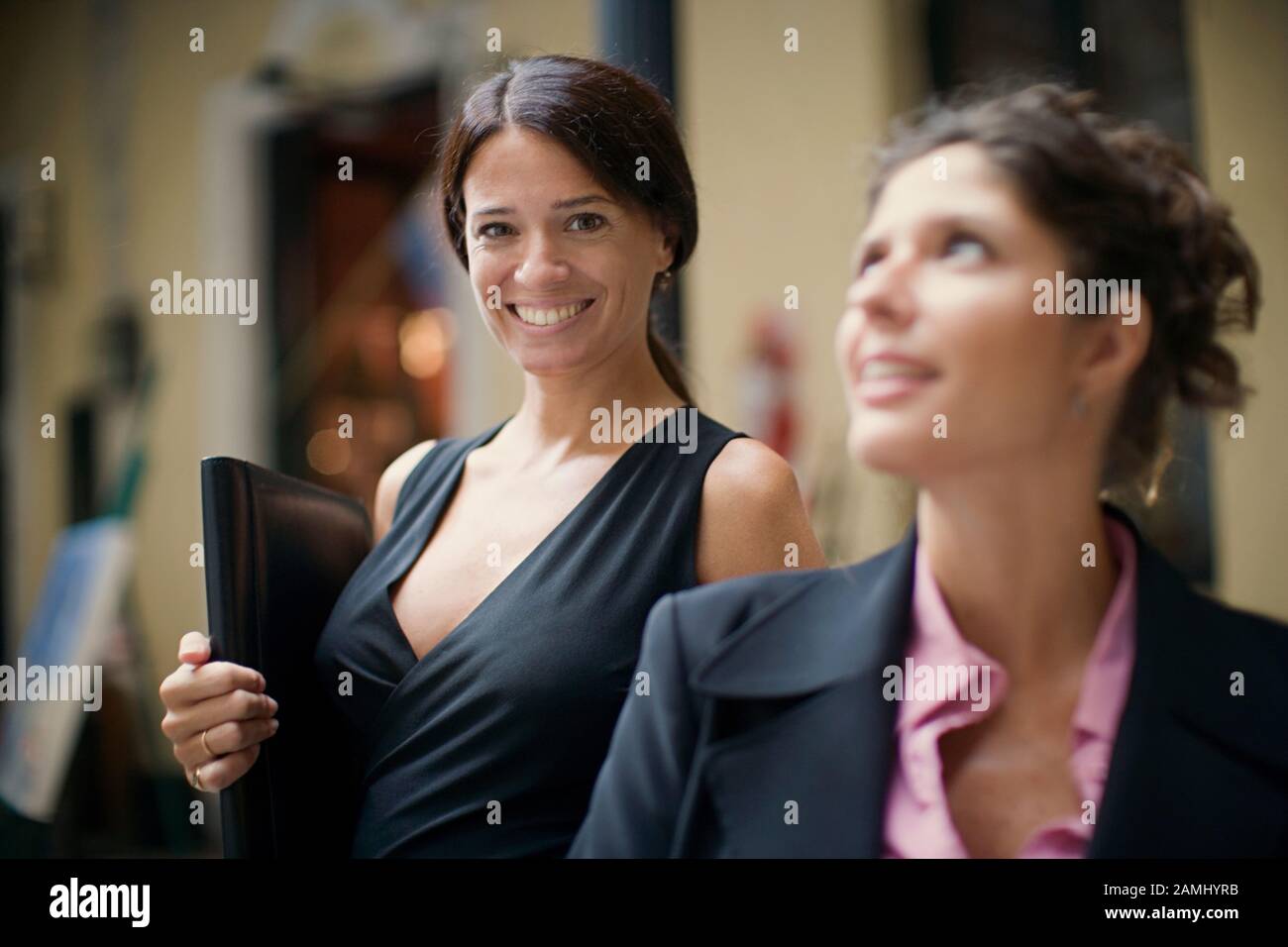 Two beautiful young women posing hi-res stock photography and images ...