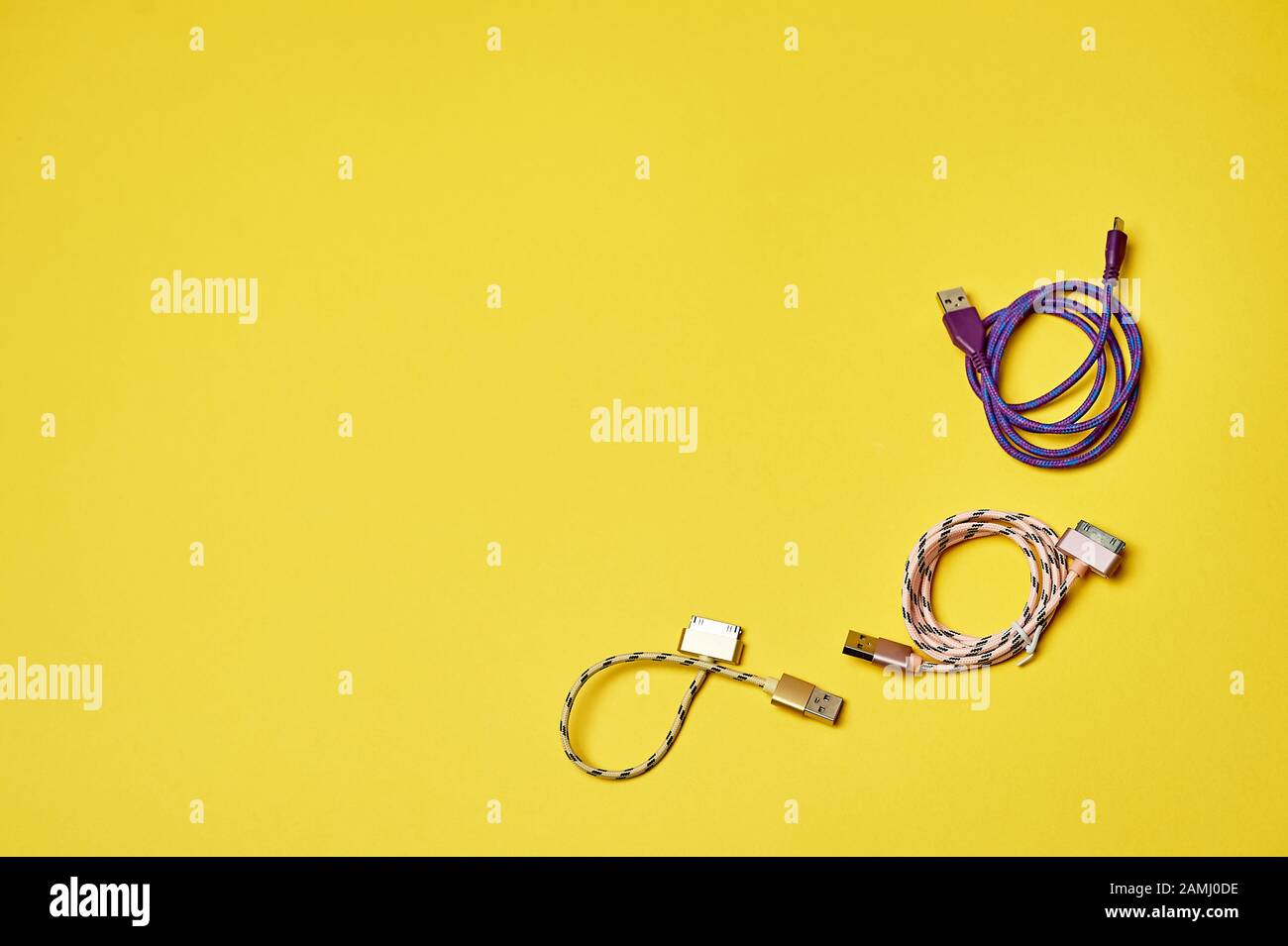 Electric charging for devices.Electronics. Minimalism. Yellow Stock ...