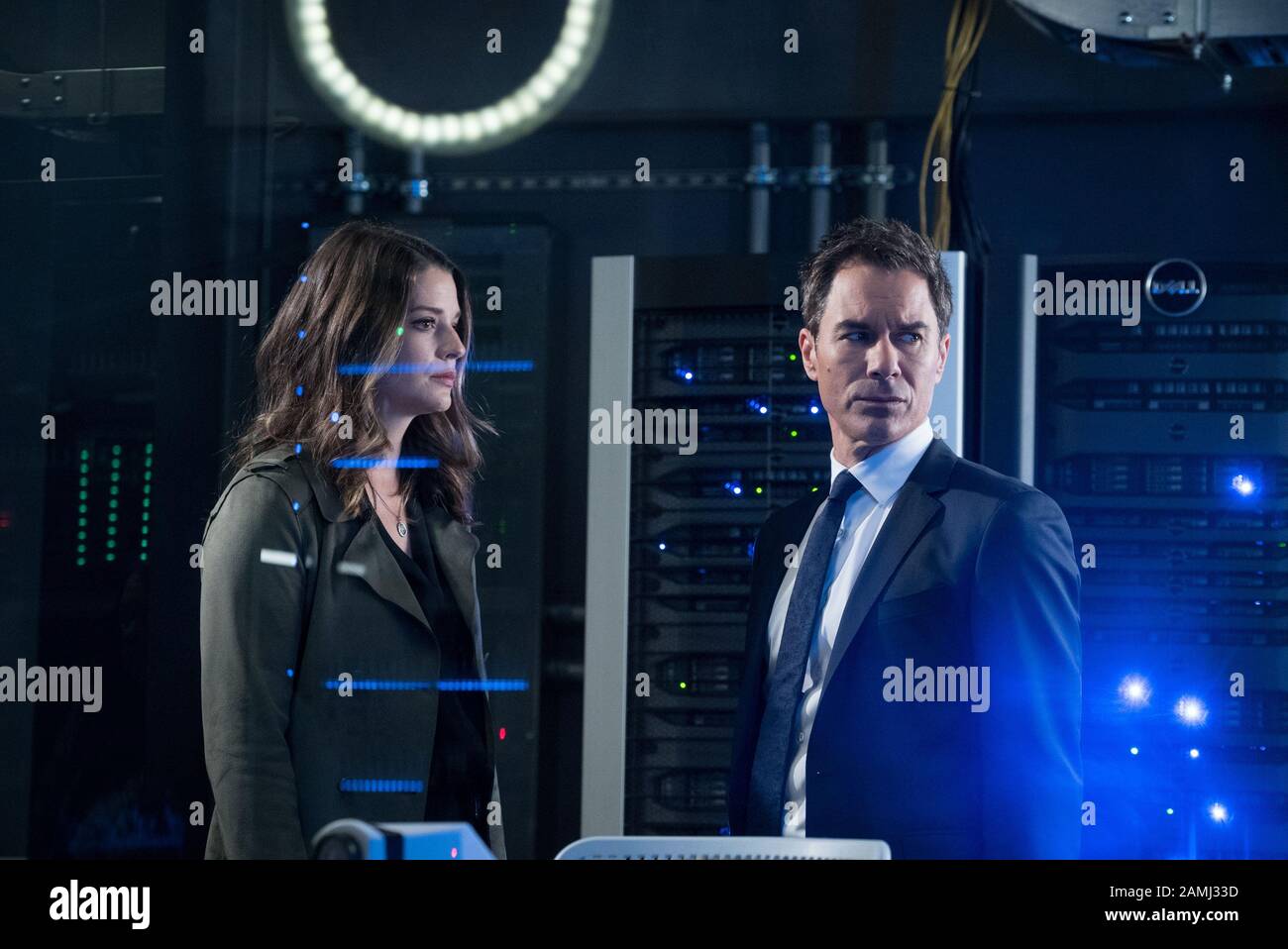 TRAVELERS, from left: Kimberley Sustad, Eric McCormack, 'Perrow ...