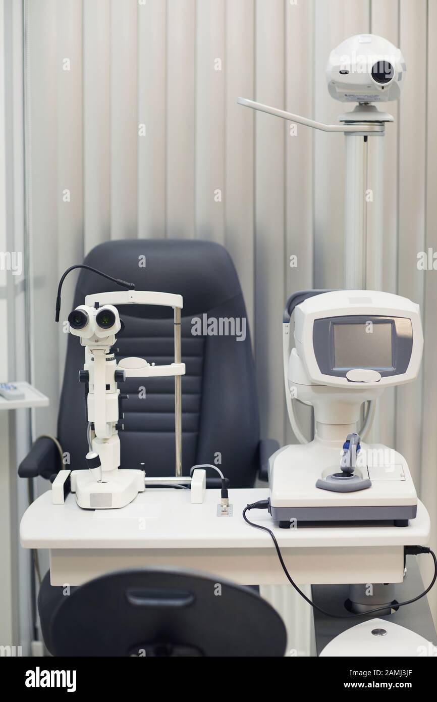 Background image of modern optometrist equipment and machines in ...