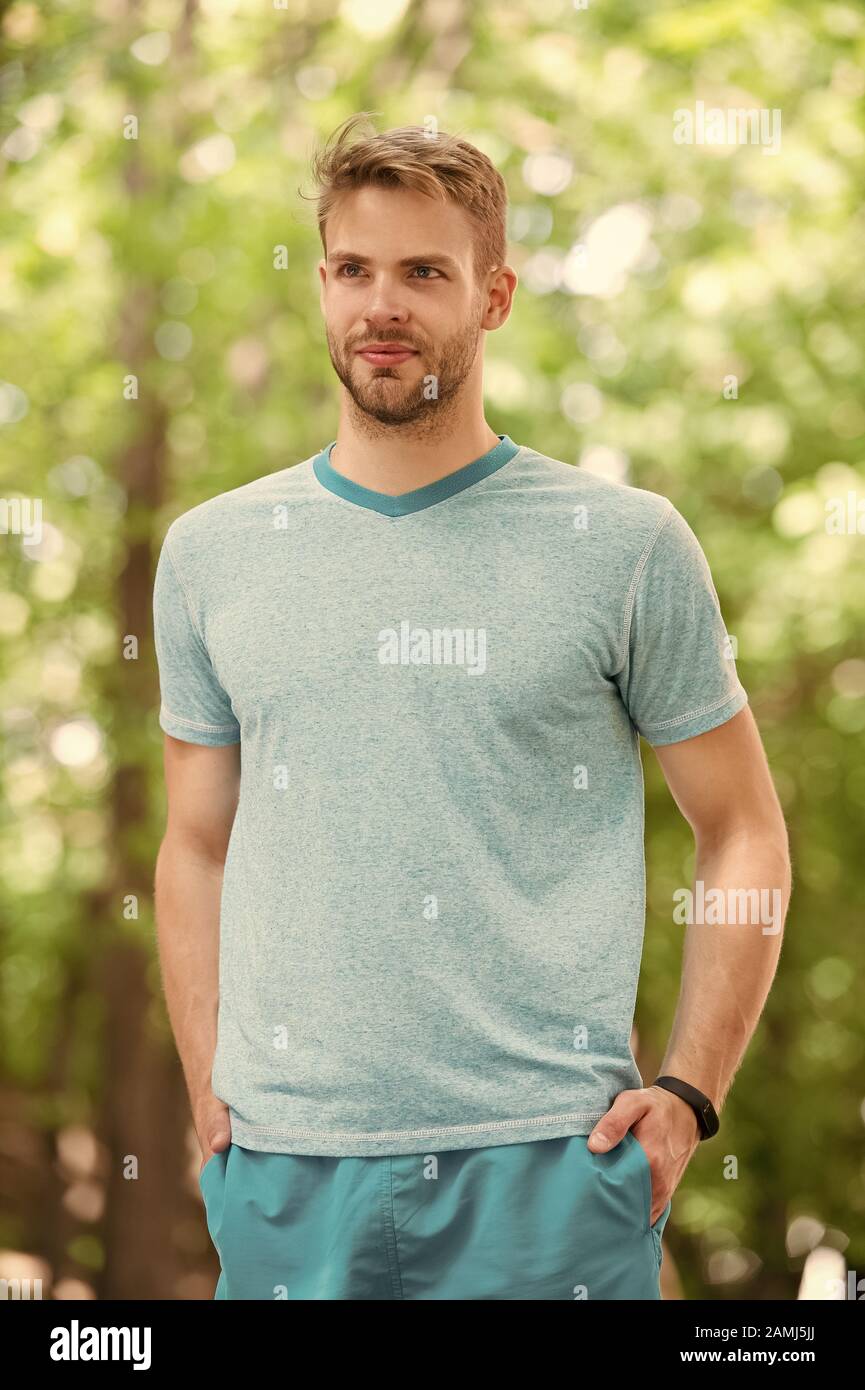 Sport is way of life. Sportsman lifestyle. Handsome athlete in park ...
