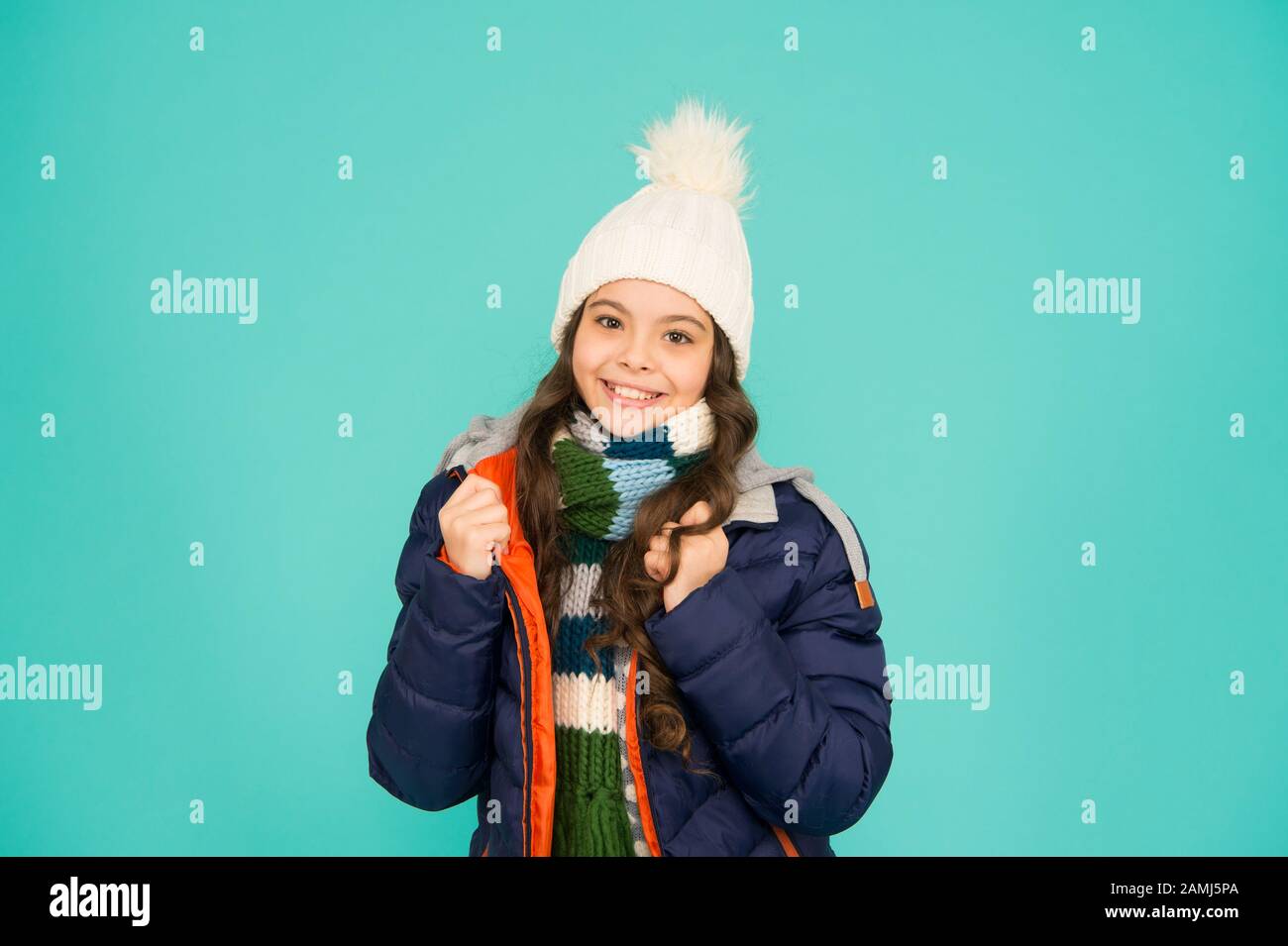 Clothing designed with active kid in mind. Happy kid in winter wear ...