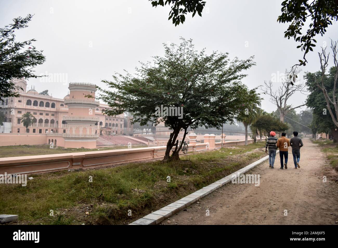 Visitors walk around the Sheesh Mahal (Palace of Mirrors) in Patiala ...