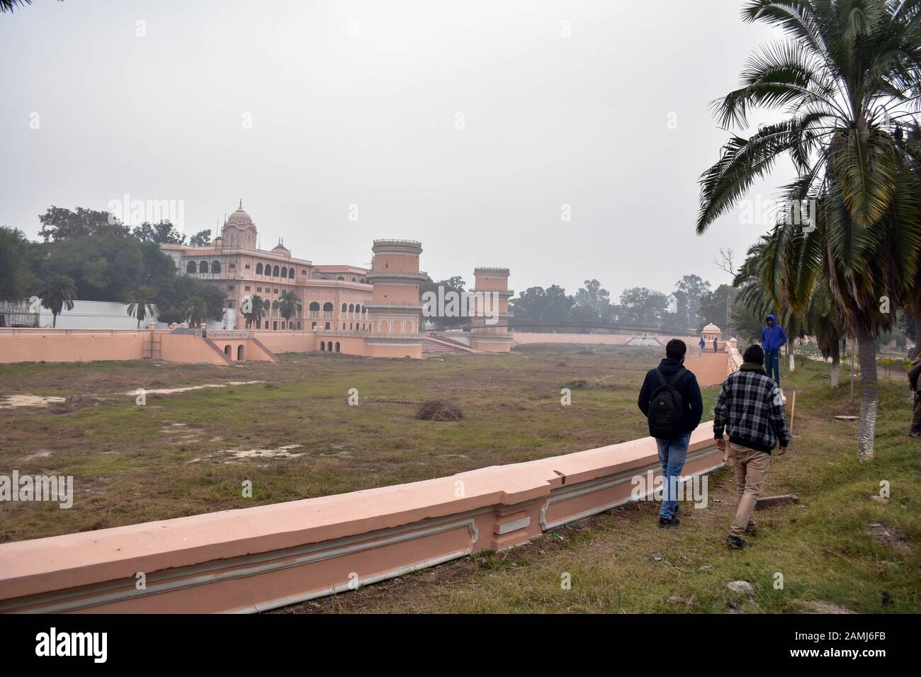 Visitors walk around the Sheesh Mahal (Palace of Mirrors) in Patiala ...