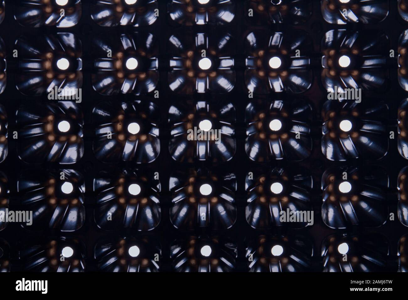 Patterned black cells with lighting texture Stock Photo - Alamy
