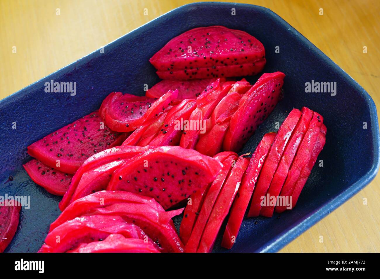 Cut slices of pink dragon fruit (pitaya Stock Photo - Alamy