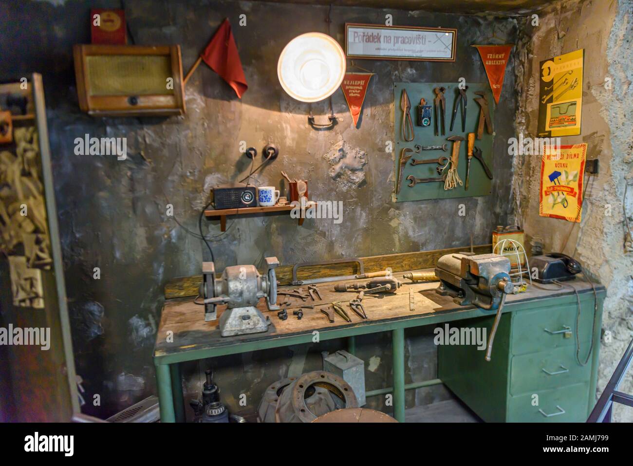 Tools inside a very old fashioned workshop in soviet era Czechosolvakia ...