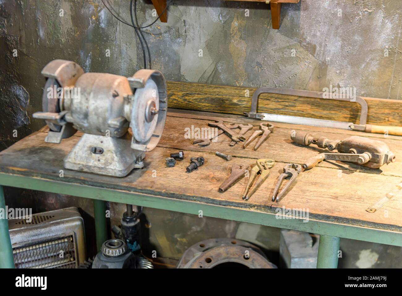 Tools inside a very old fashioned workshop in soviet era Czechosolvakia ...