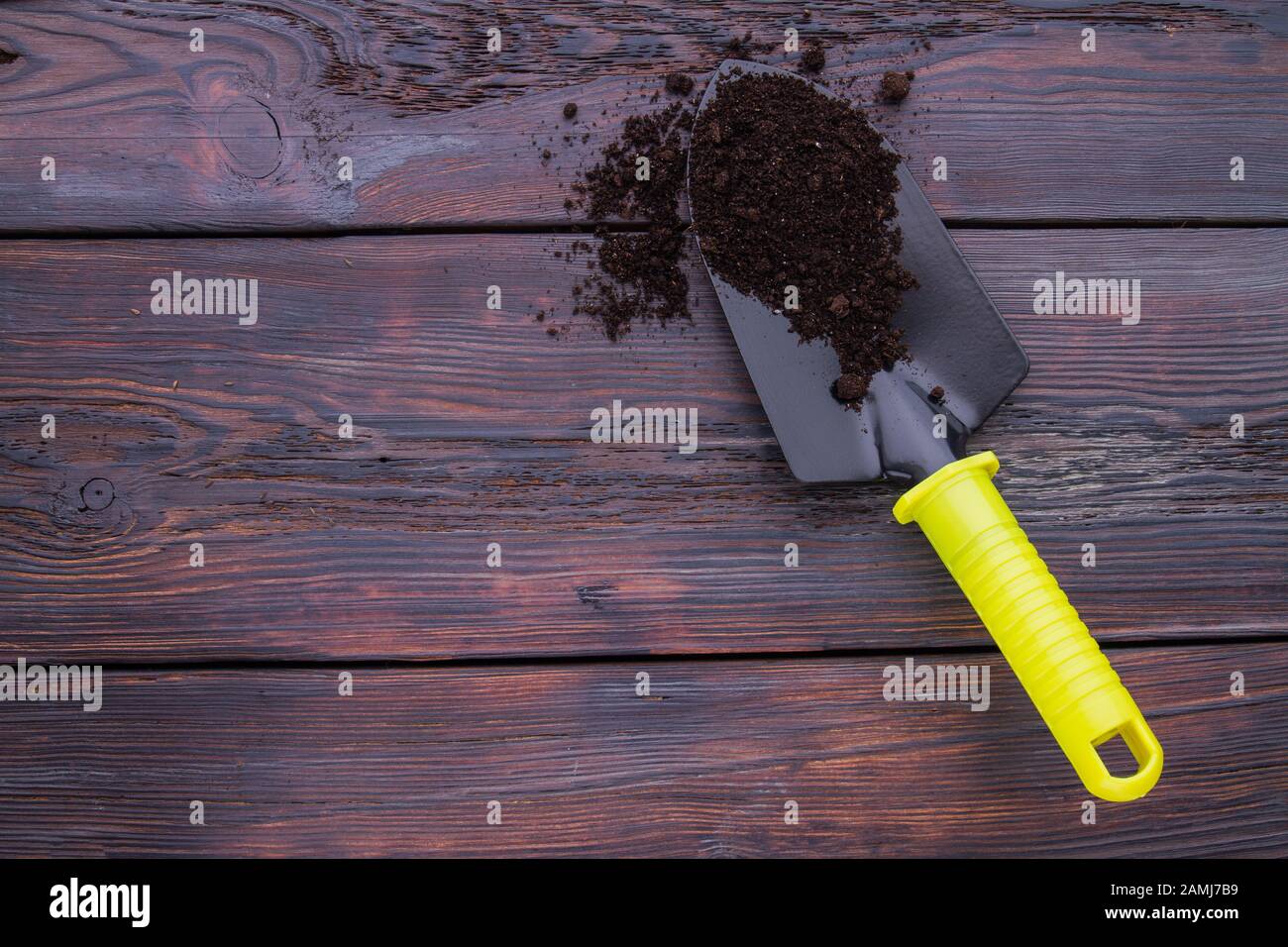 Trowel shovel tool with soil Stock Photo - Alamy