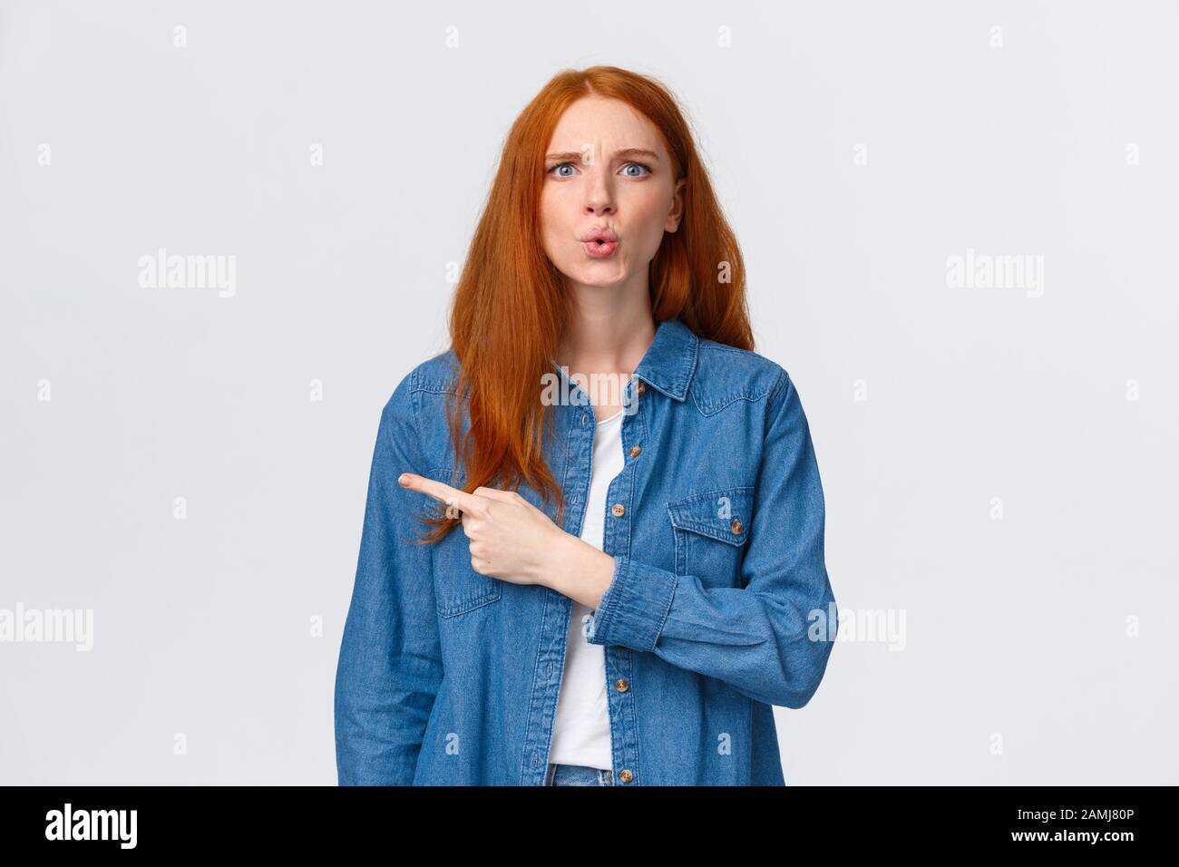 What Is That Alluring Redhead Girl In Denim Shirt Staring Questioned