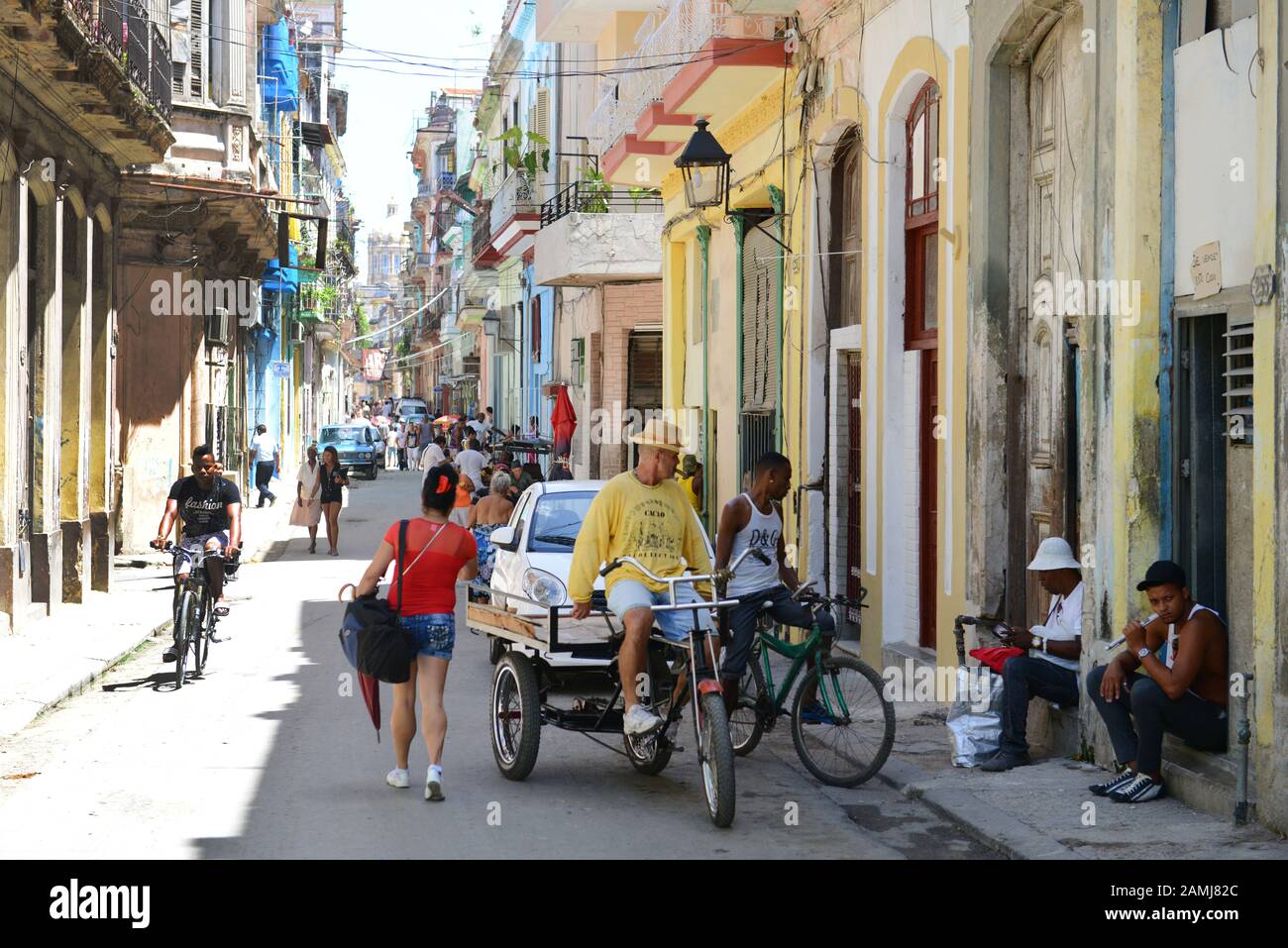 Daily life in the colorful streets of old Havana, Cuba Stock Photo - Alamy