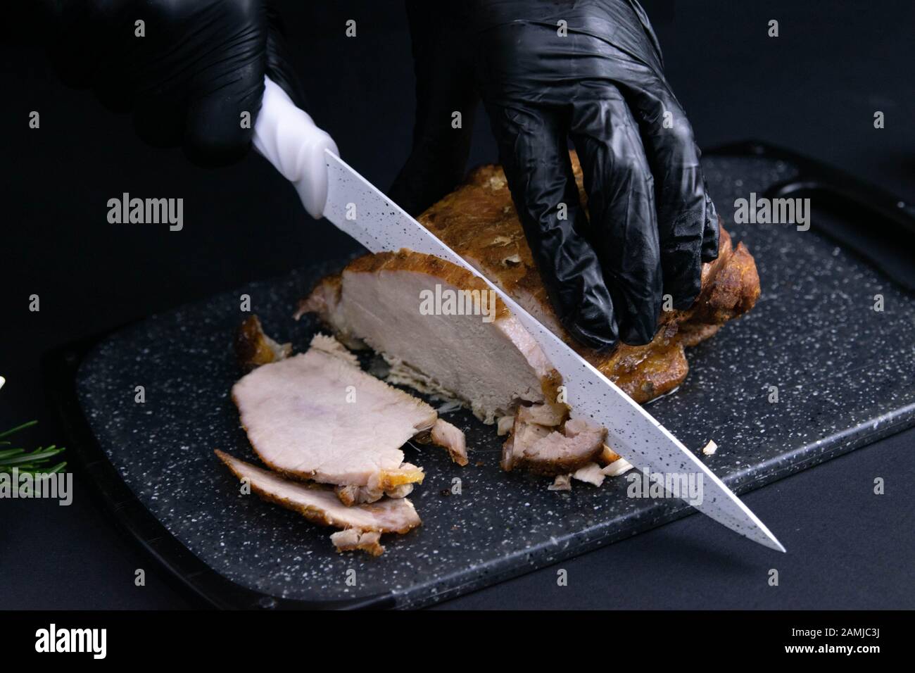 Slicing juicy beef steak by knife in chef hands closeup. Food cooking ...