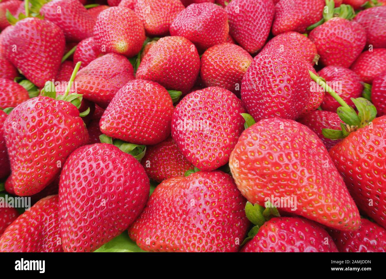 Strawberries texture hi-res stock photography and images - Alamy