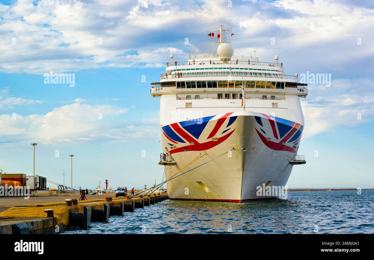 Port with cruise ship at Cagliari reflex Stock Photo - Alamy
