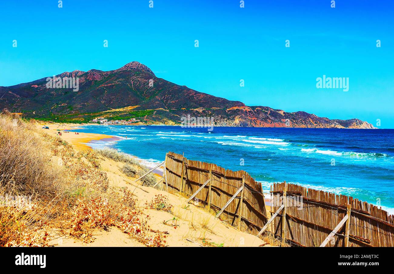 Beach at Mediterranean sea Buggerru Carbonia Iglesias reflex Stock ...