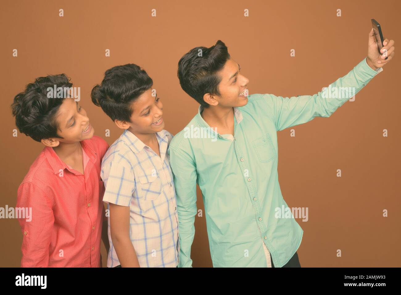 Side three brothers hi-res stock photography and images - Alamy