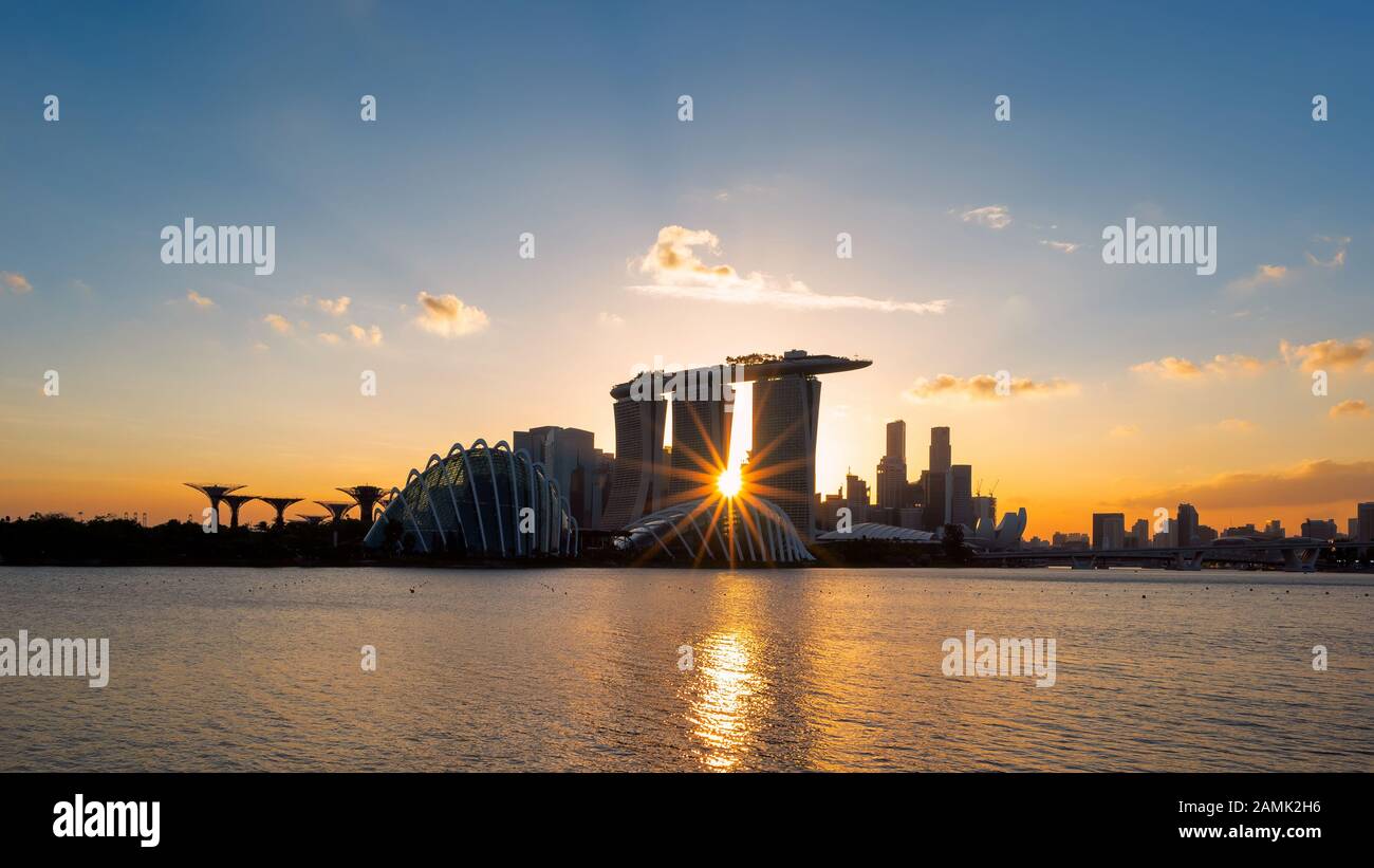 Singapore city view of business downtown building area from marina barrage during sunset at ...