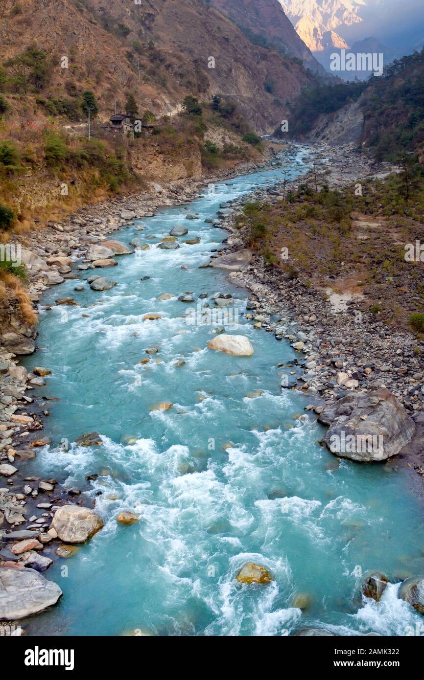 Nature river flowing from mountain along Pooh Hill trekking route with ...