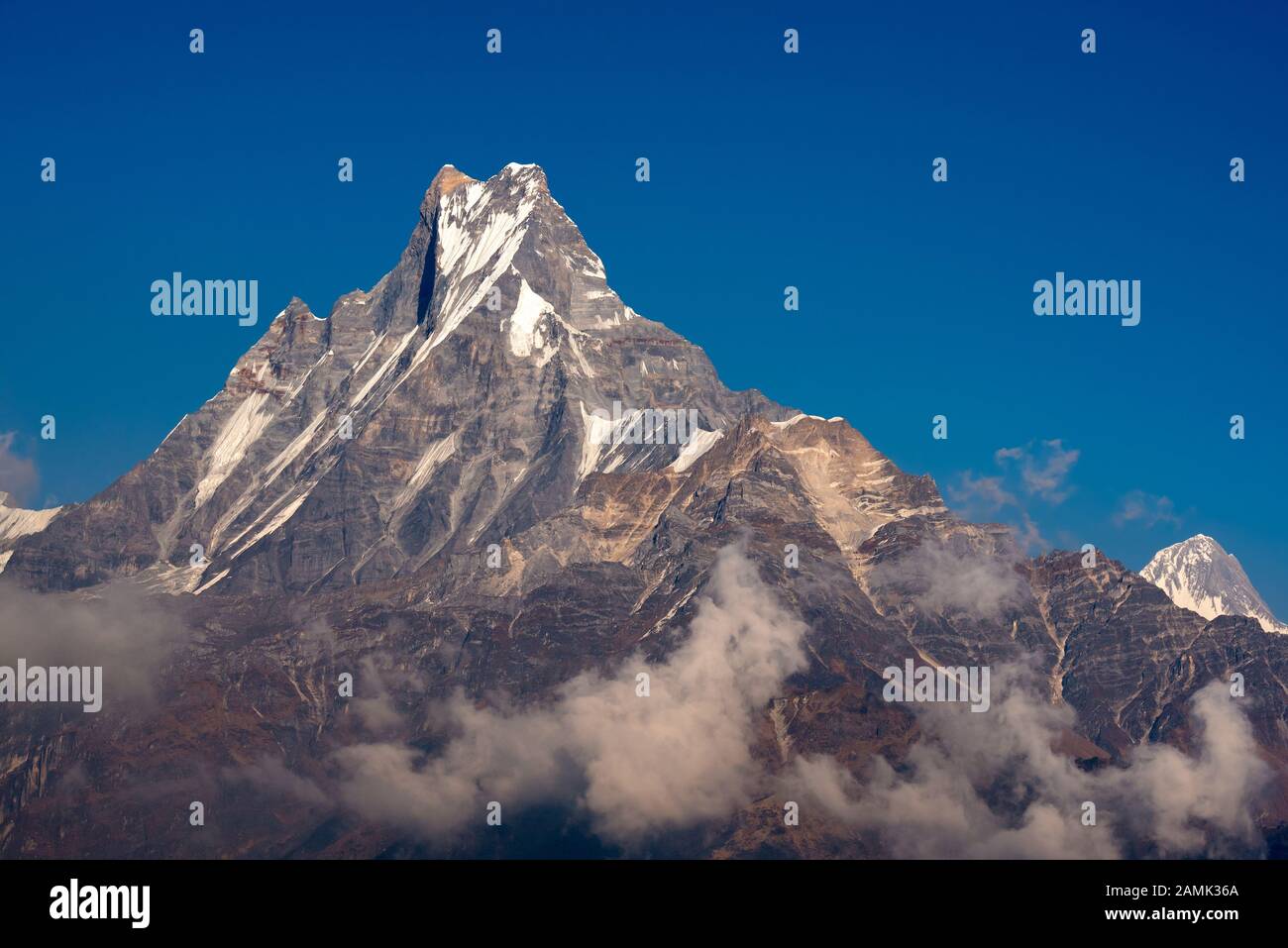 Fishtail peak or Machapuchare mountain with clear blue sky background ...