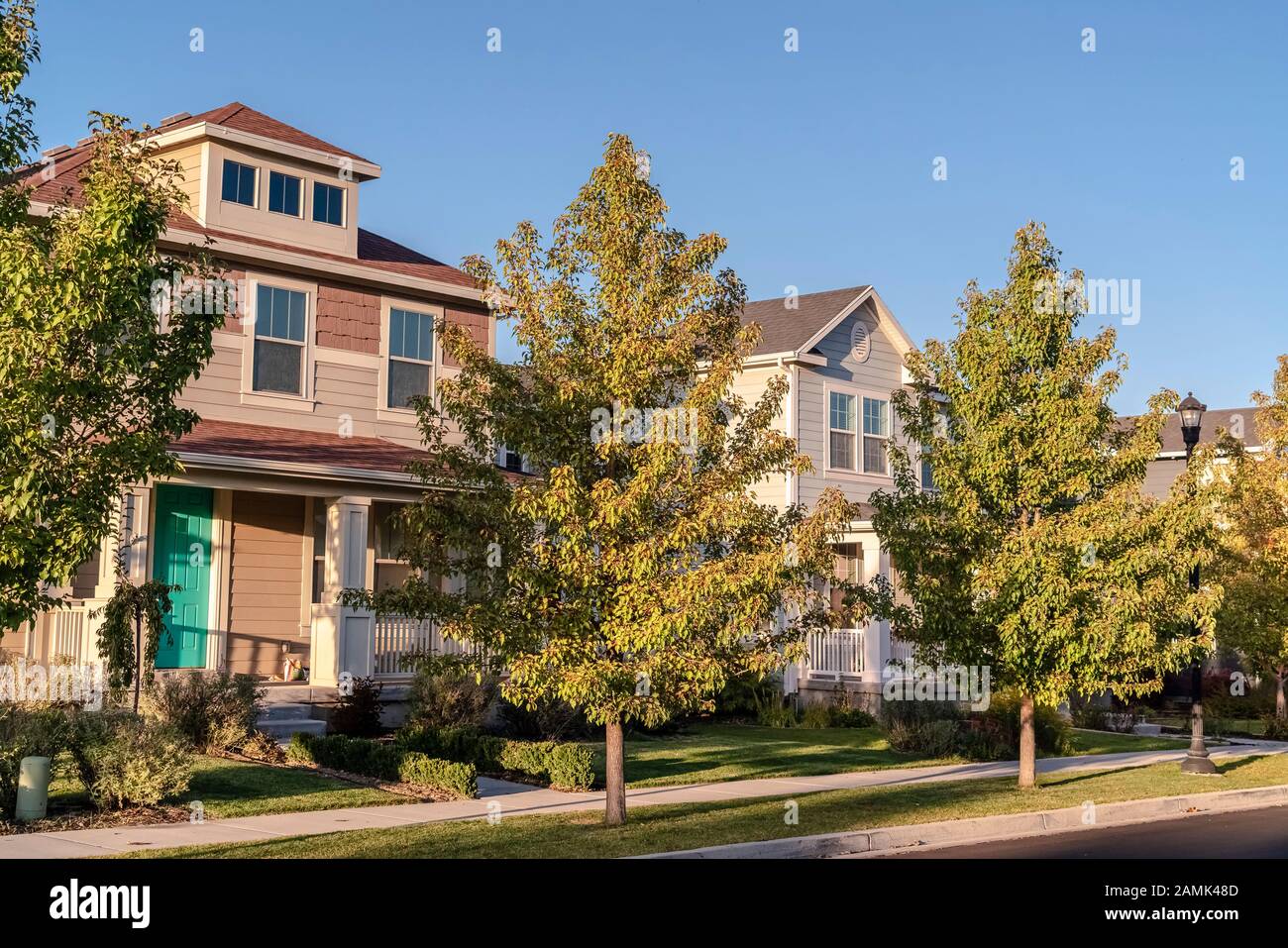 Row of houses on an urban street Stock Photo - Alamy