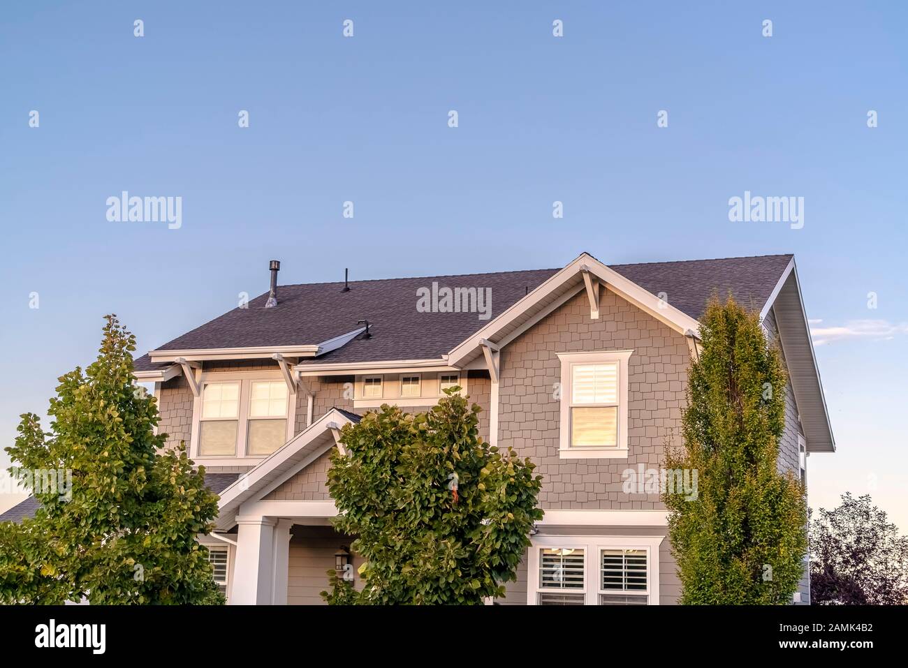 Double storey modern brick house day light Stock Photo - Alamy