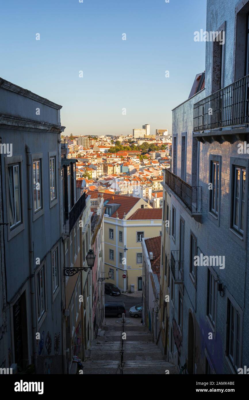 City viewed from above atop of narrow flight of stairs in Lisbon ...