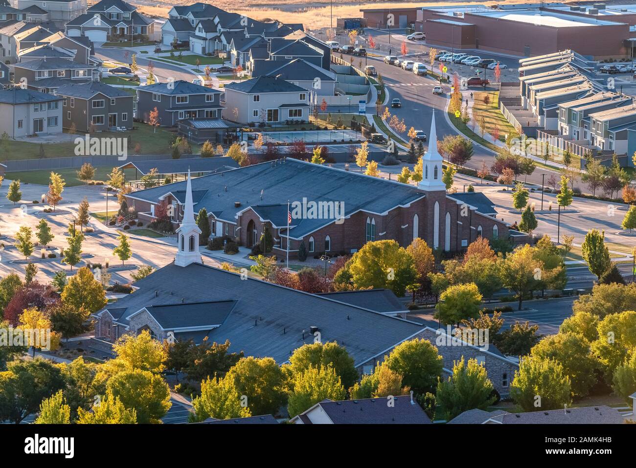 Large church complex in a modern housing estate Stock Photo - Alamy