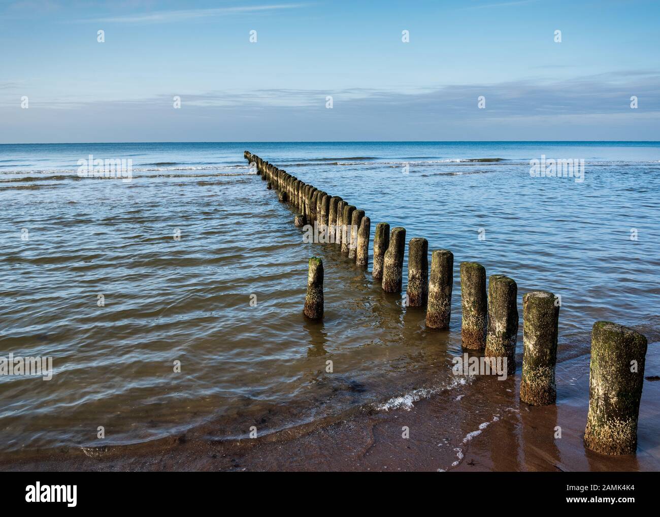 View to coast of Baltic sea with old mole Stock Photo - Alamy