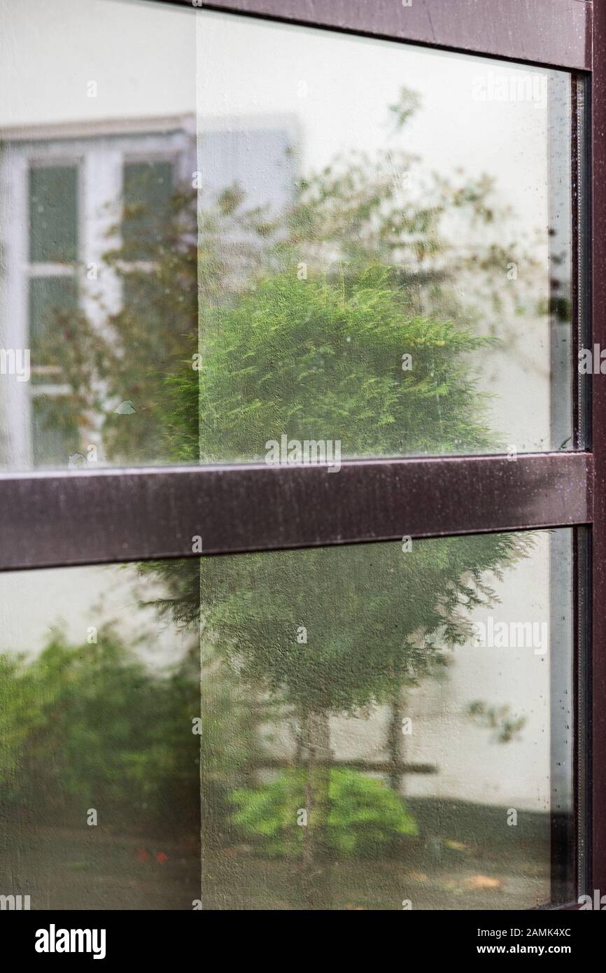 Reflection on glass of window Stock Photo - Alamy