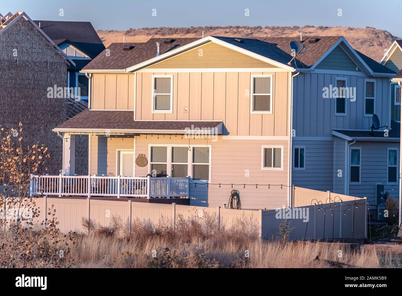 Backyard of two story house in American town Stock Photo - Alamy