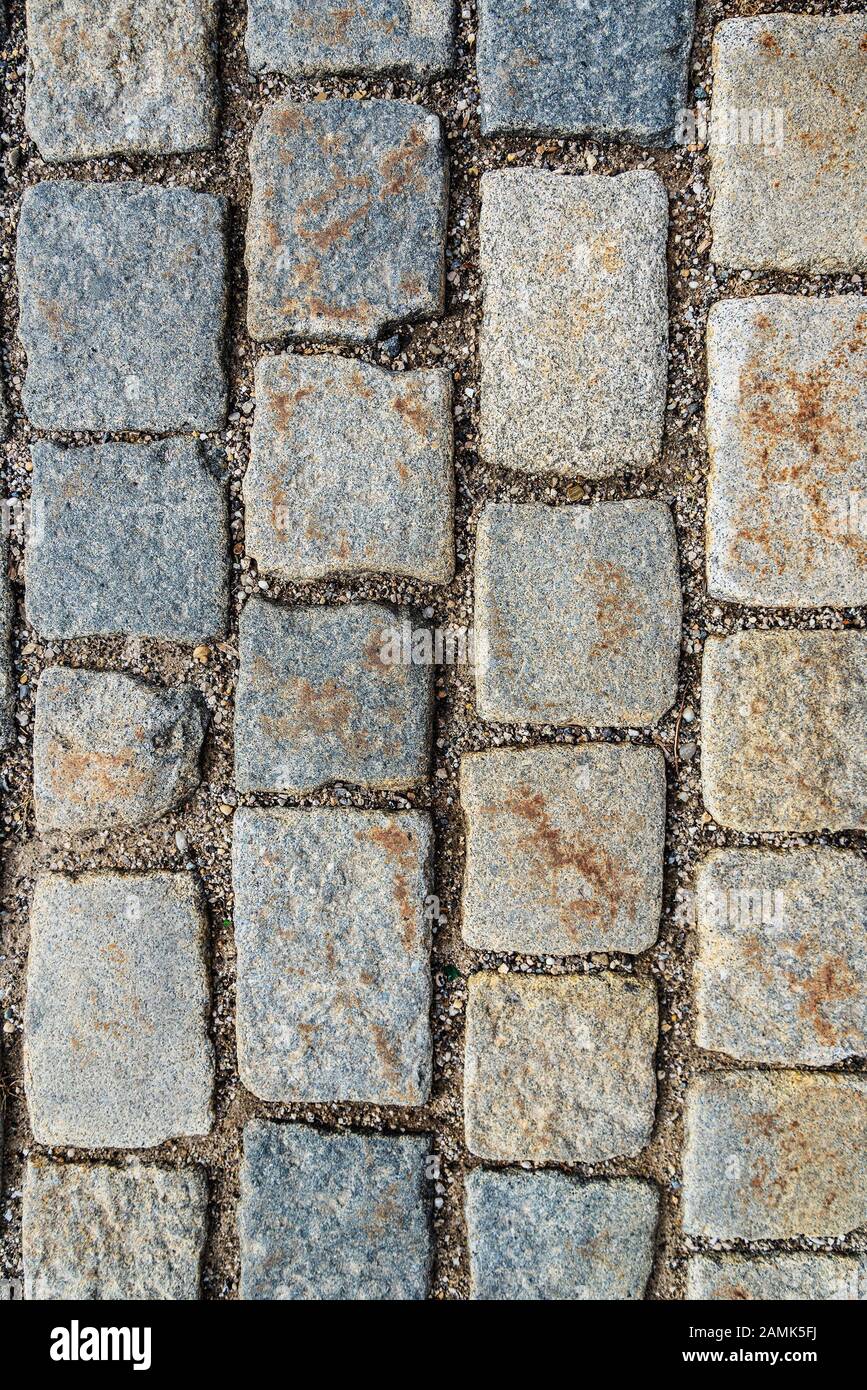 Surface of weathered stone road Stock Photo - Alamy
