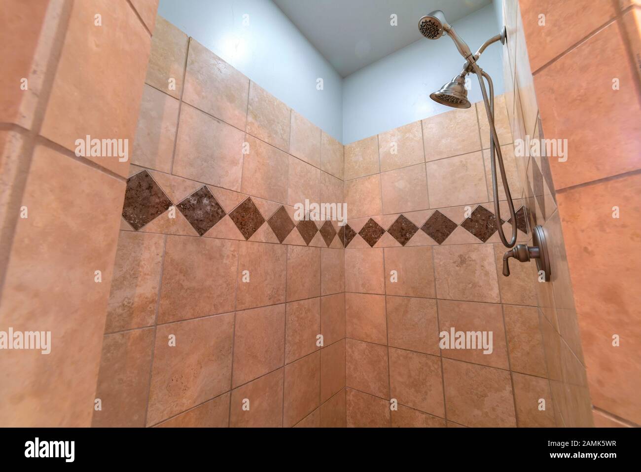 Tiled shower with decorative diamond pattern bright interior Stock ...