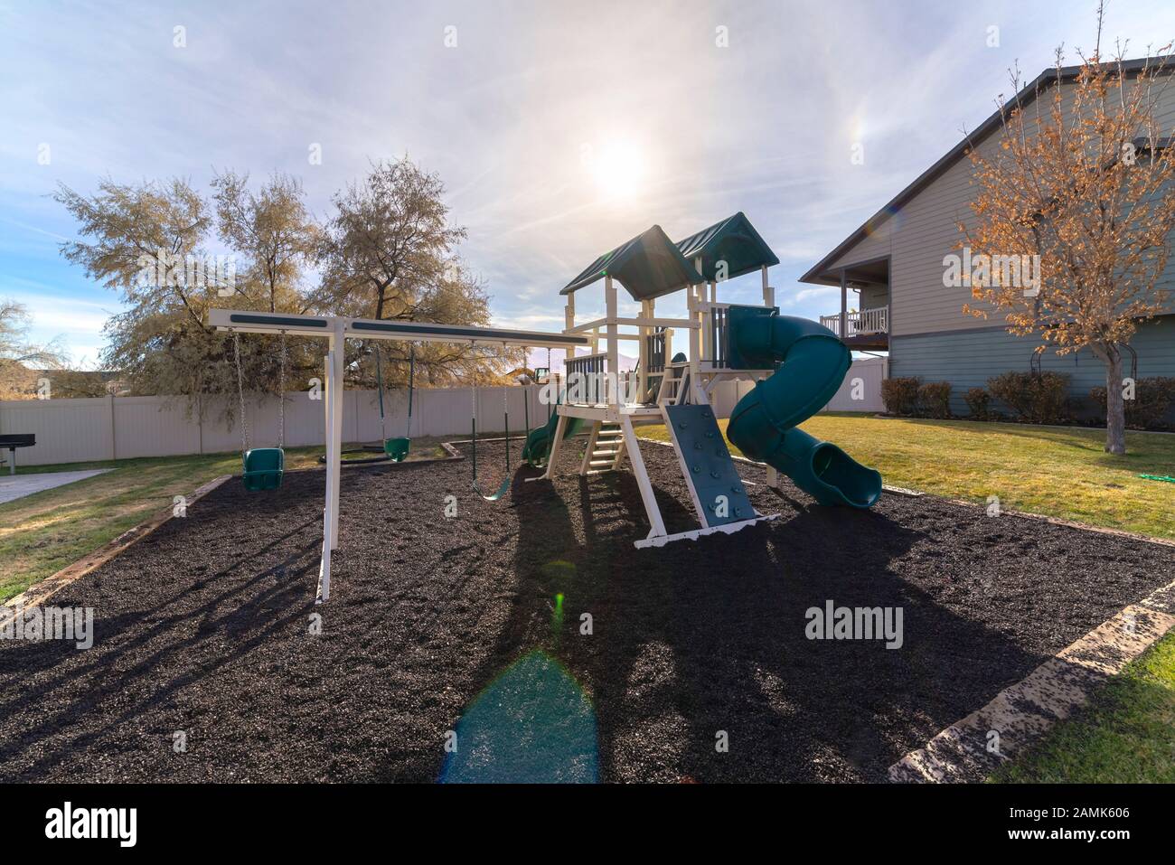 Small kids playground in a private garden Stock Photo - Alamy