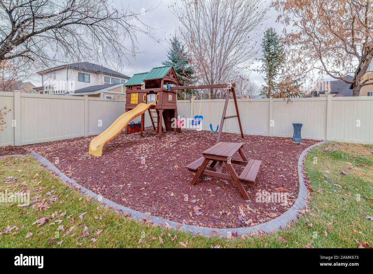 Small kids playground in a private backyard Stock Photo - Alamy