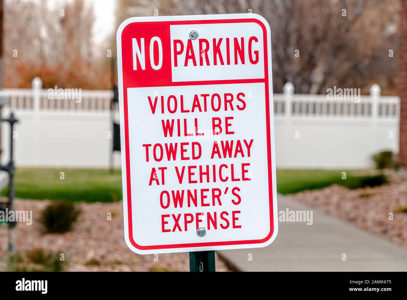 No Parking sign with Tow Away warning Stock Photo - Alamy