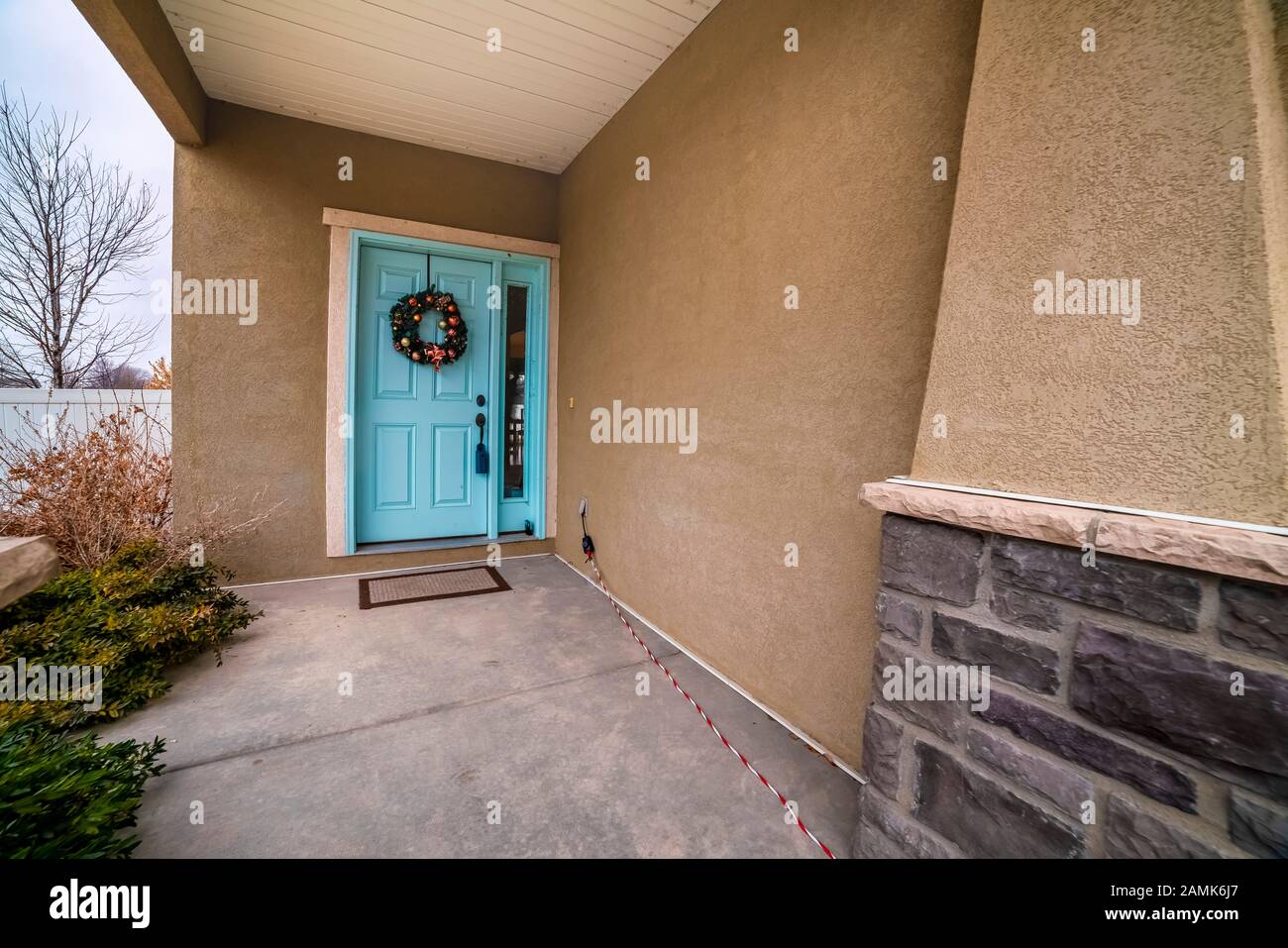 Colorful bright blue front door to a home Stock Photo - Alamy