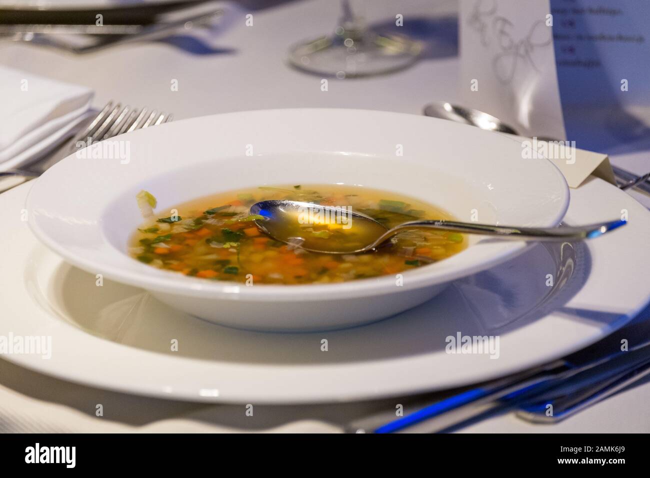 Older woman Eating Soup At a Restaurant setting Stock Photo - Alamy
