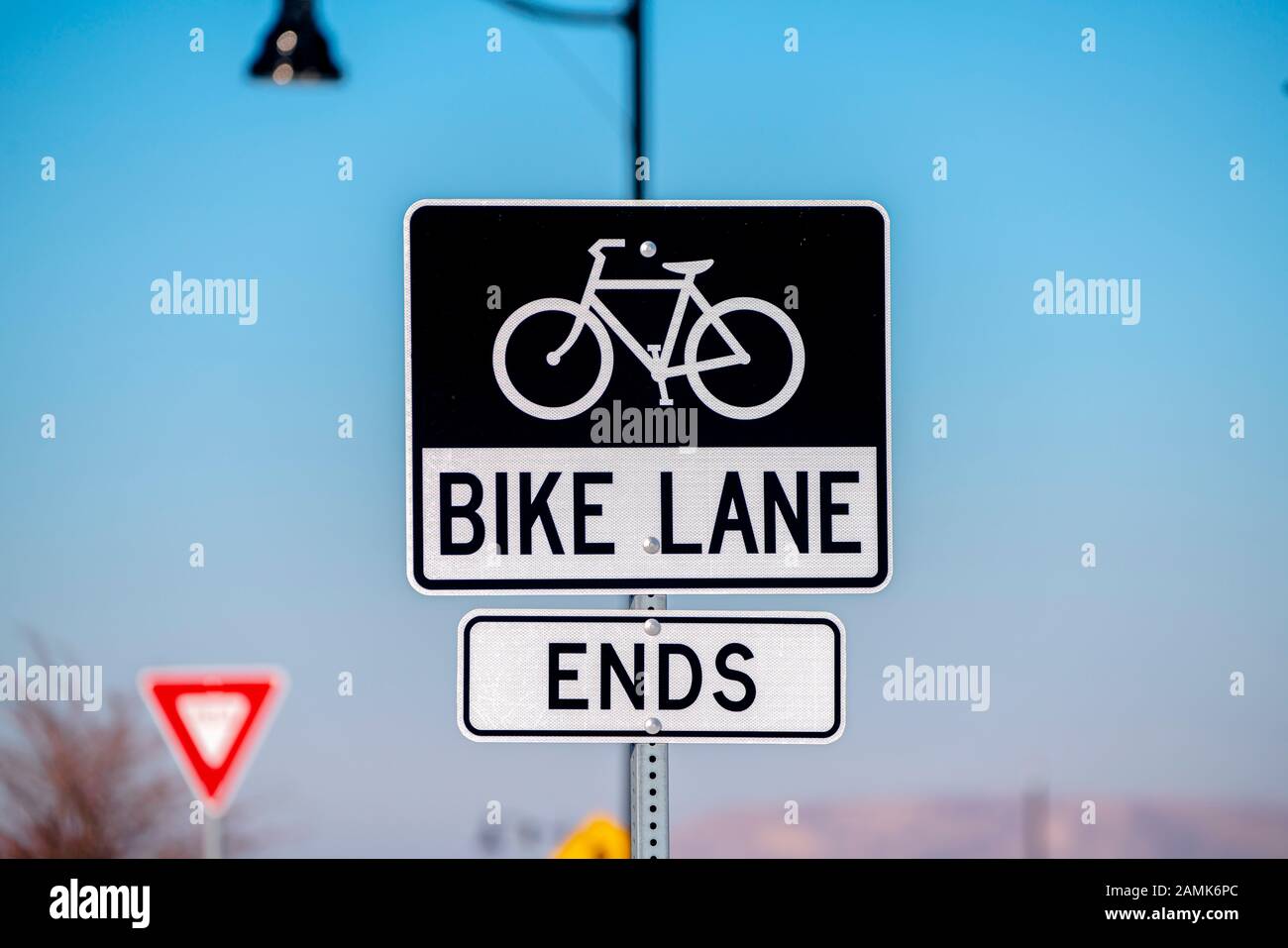 Warning traffic sign for the end of a Bike lane Stock Photo - Alamy