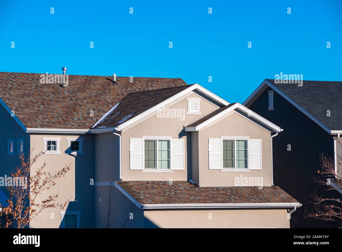 Modern house upper floor with shutters on windows Stock Photo - Alamy