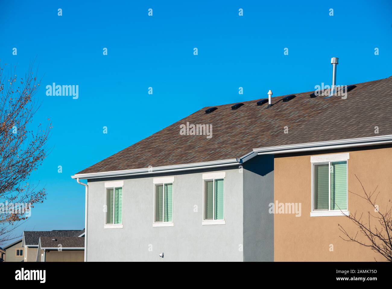 Upstairs windows in a double storey house Stock Photo - Alamy