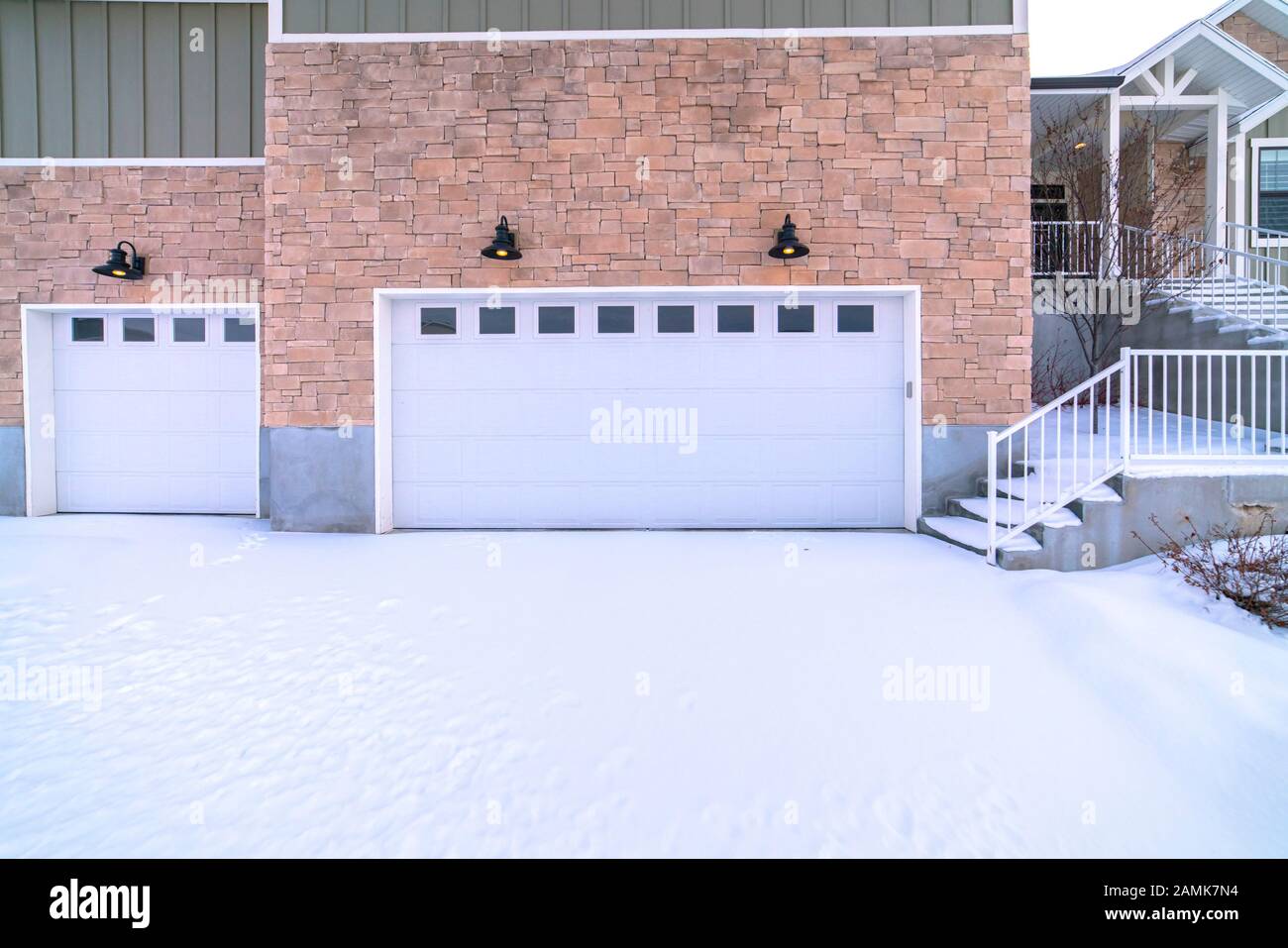 Garage forecourt covered in snow day light Stock Photo - Alamy