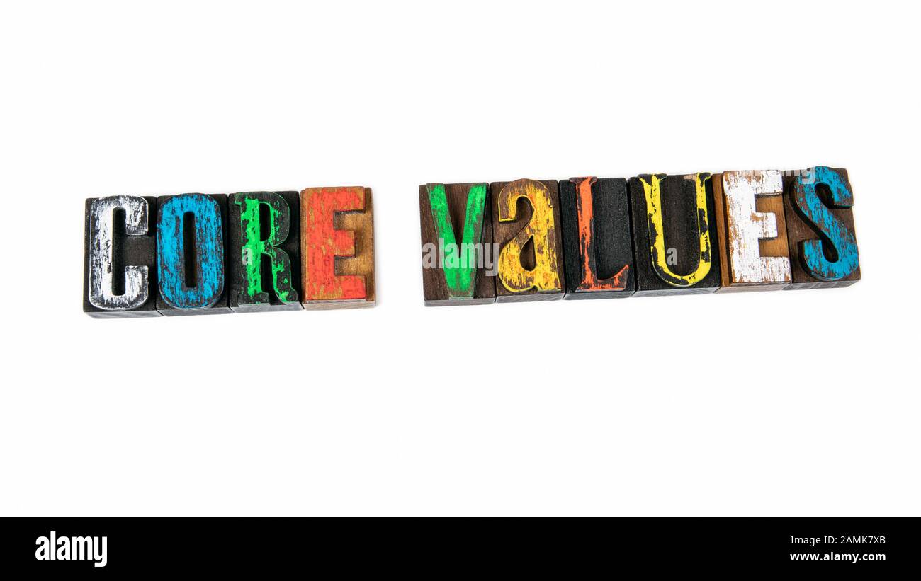Core values. Abstract background. Colored wooden letters on a white ...