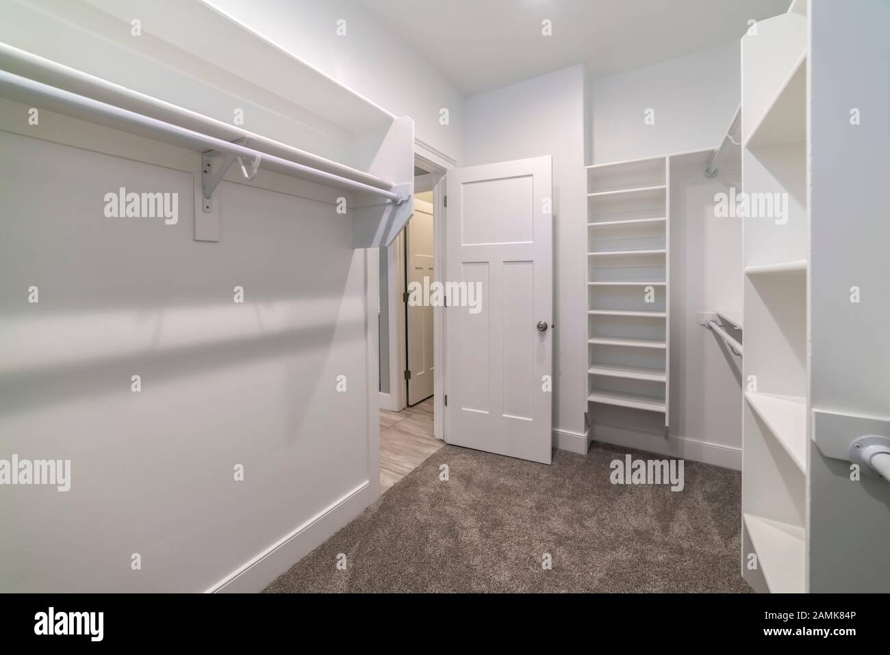 Interior of an empty walk-in closet or wardrobe Stock Photo - Alamy